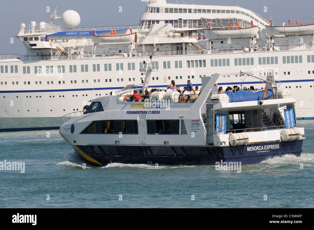 Passengers aboard a ferry bound for Formentera departing Eivissa ...