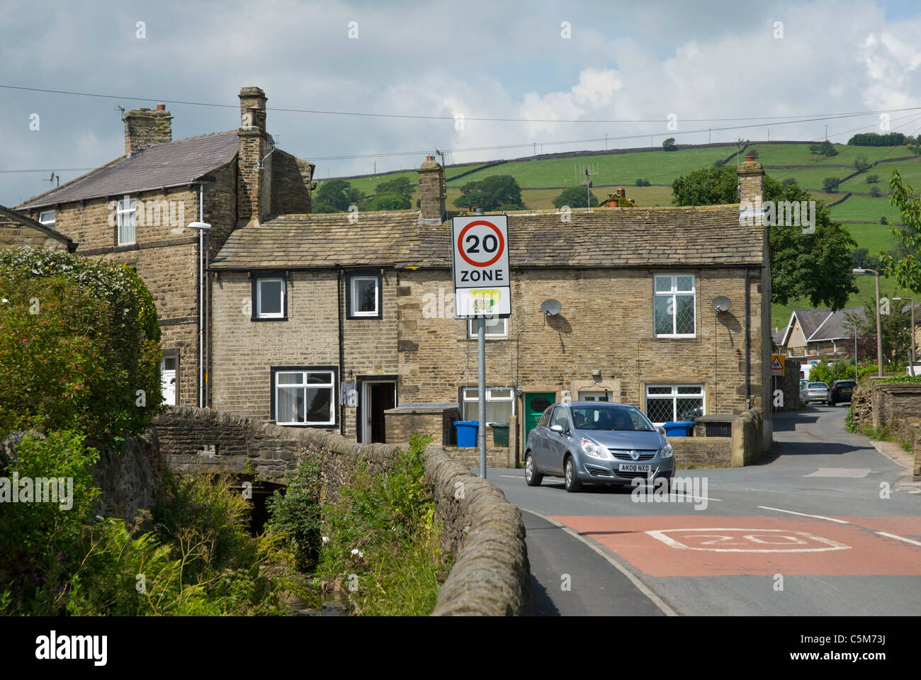 Car in 20mph speed limit, in village of Cononley, North Yorkshire ...