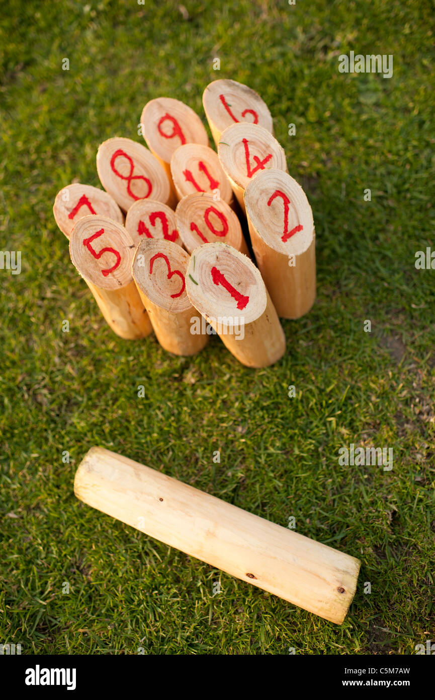 Playing a home-made version of the Finnish game "Molkky Stock Photo - Alamy