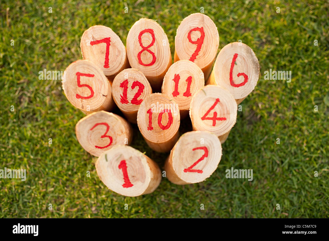 Playing a home-made version of the Finnish game "Molkky Stock Photo - Alamy