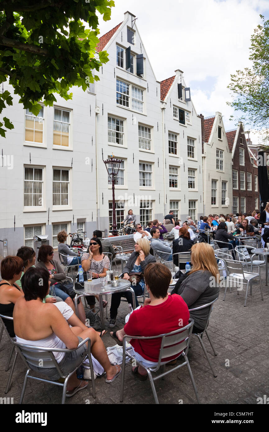 Women enjoying a drink and coffee at a cafe, Amsterdam, Holland ...