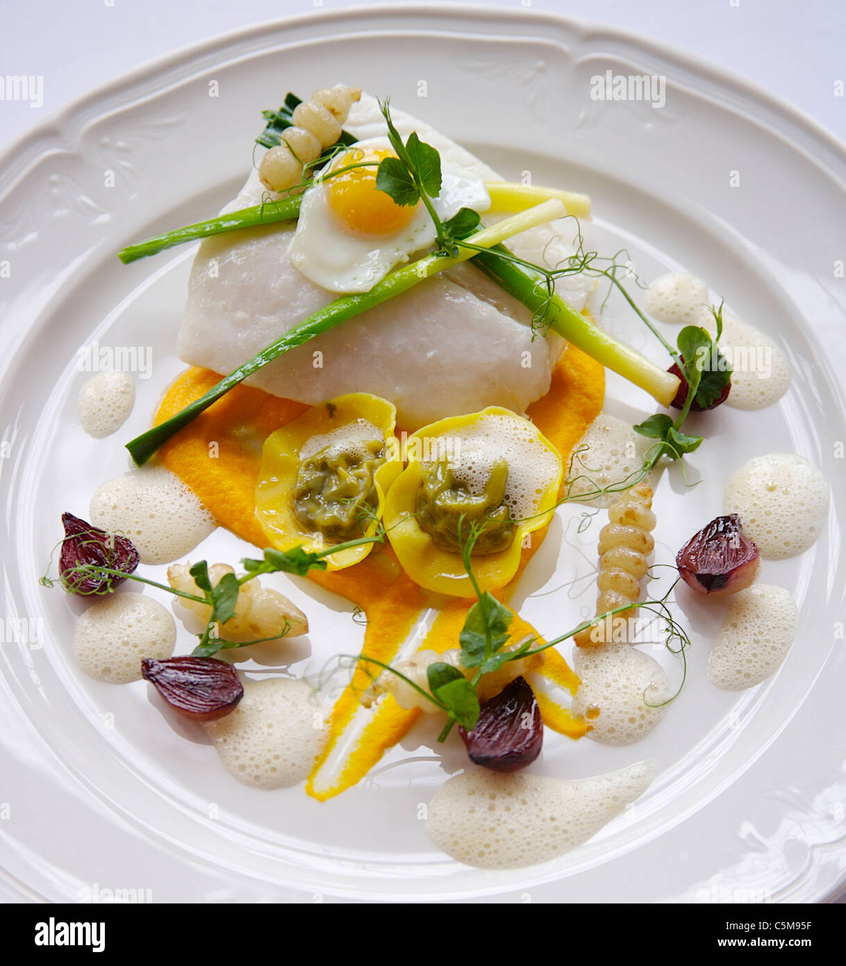 Confit Fillet of Turbot with mushroom tortellini & baby Leeks Stock ...