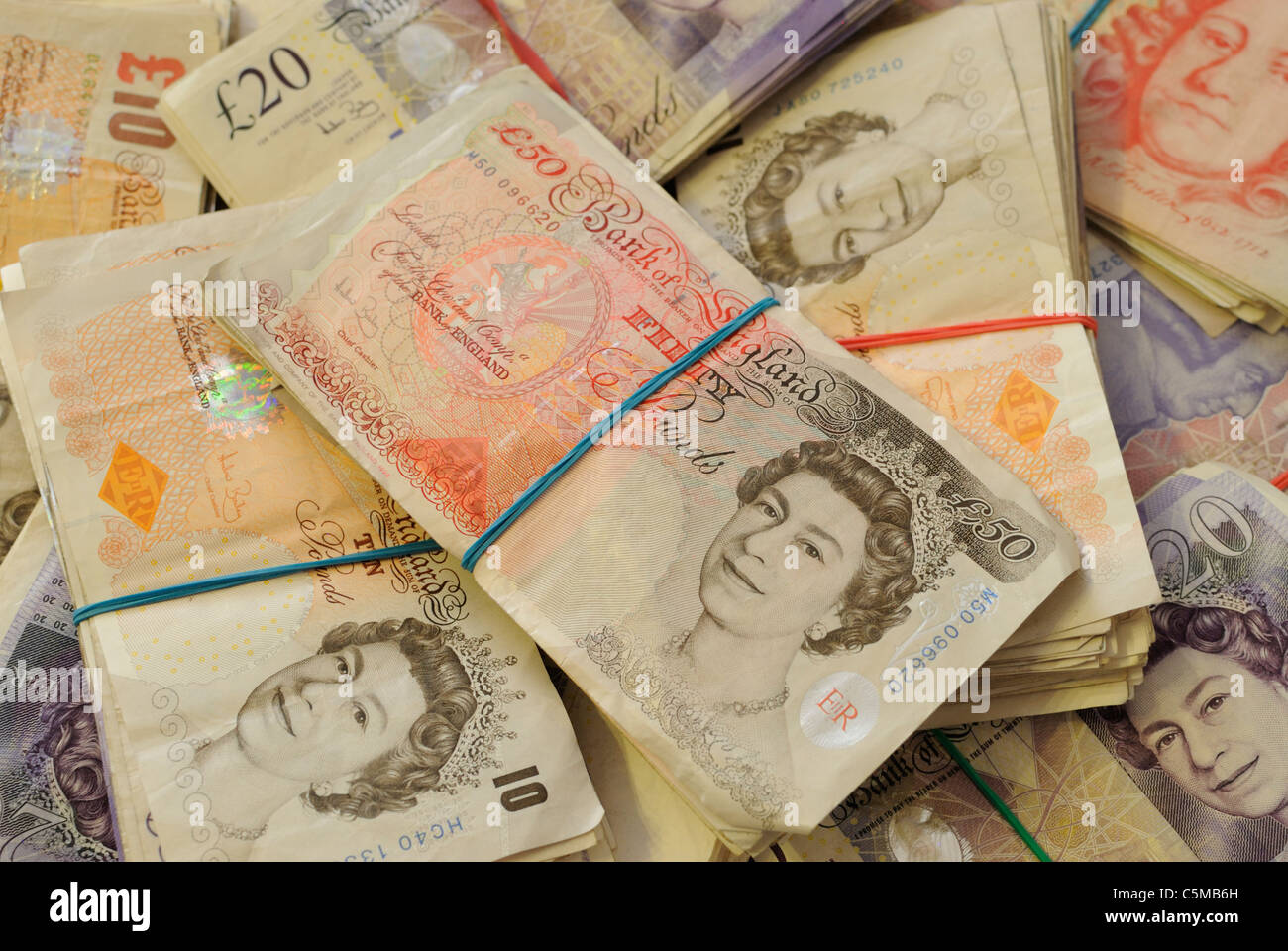 Uk bank notes bundles hi-res stock photography and images - Alamy