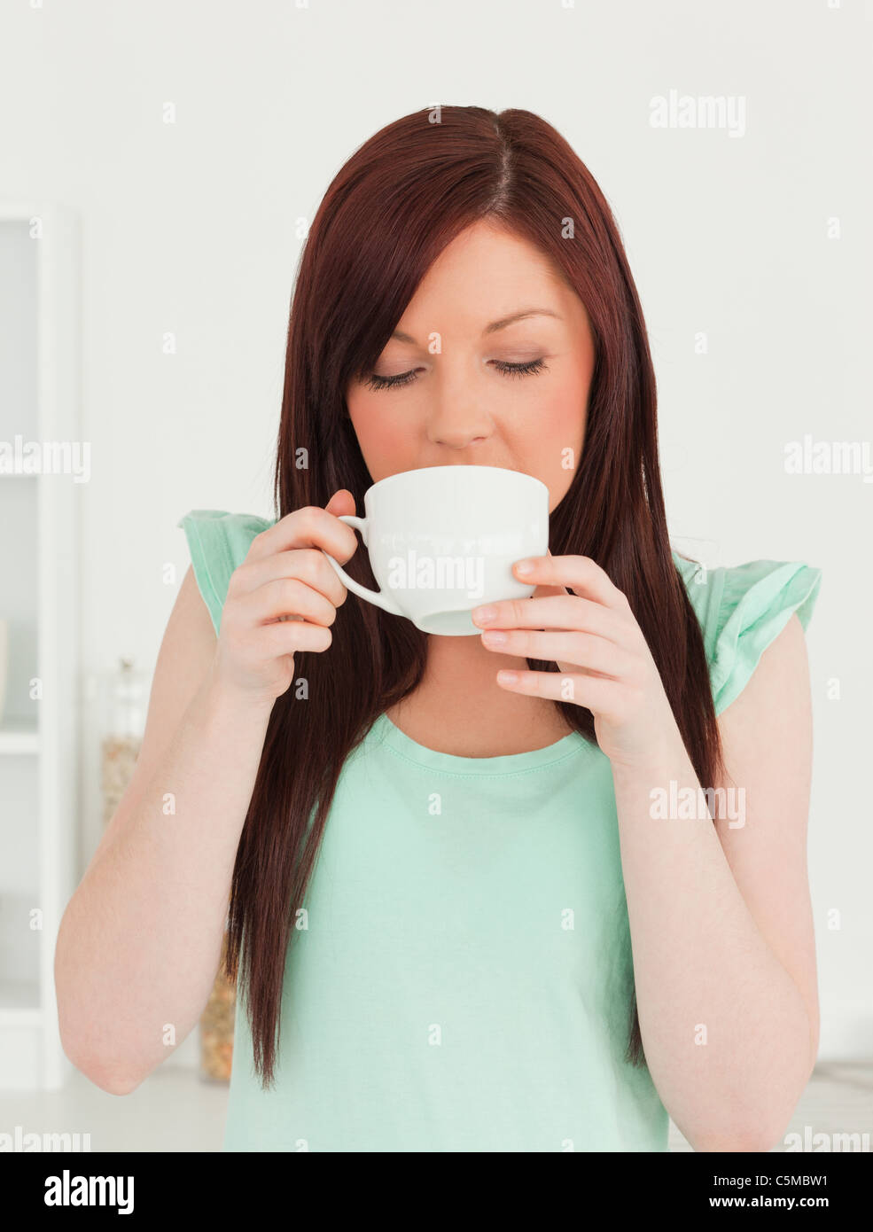 Beautiful woman posing enjoying breakfast hi-res stock photography and ...