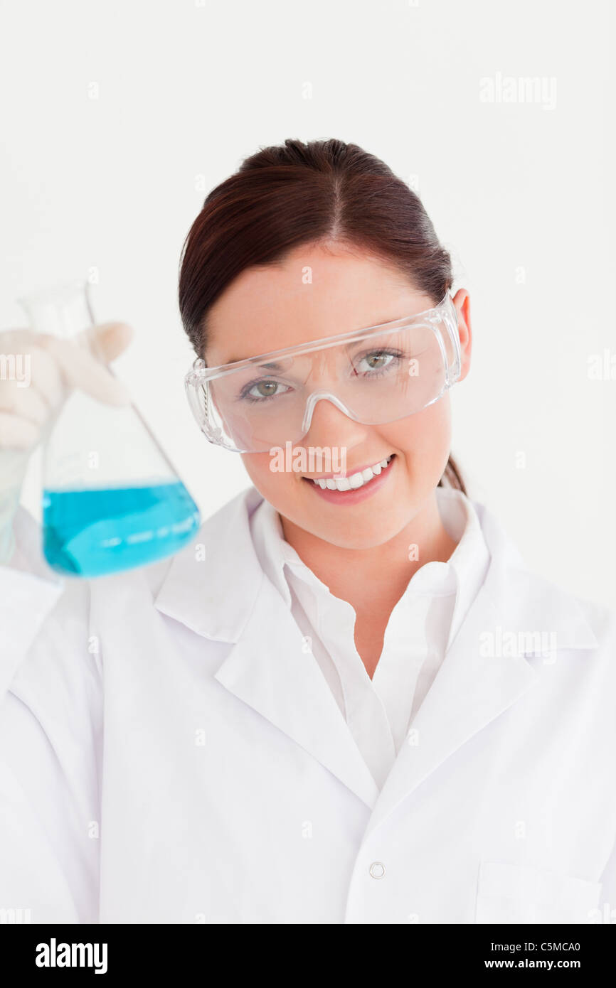 Cute scientist looking at the camera in a laboratory Stock Photo - Alamy