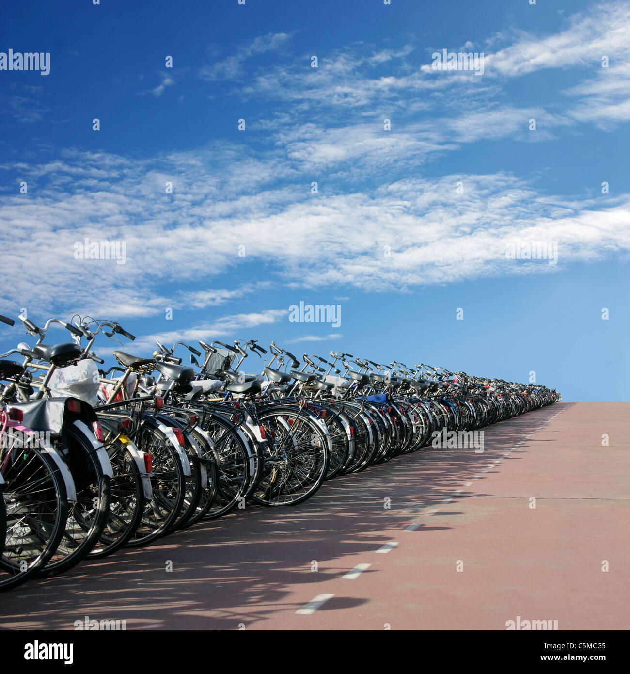 A Long Row of Bicycles Stock Photo - Alamy