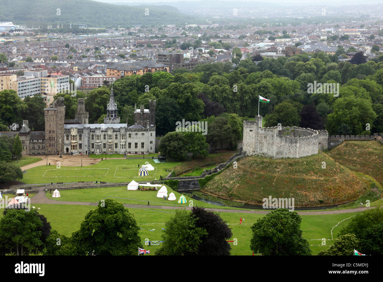 Aerial view of the Victorian Gothic revival mansion (L) and the Norman ...