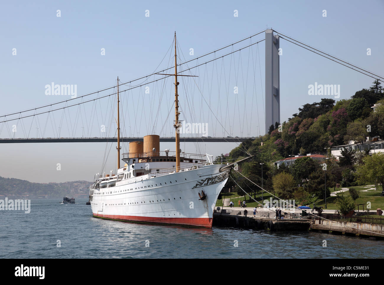 Traditional sailing ship in front of the Bosphorus bridge in Istanbul ...