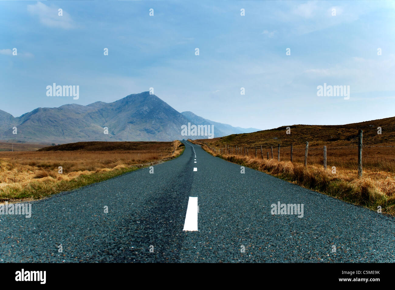 Road crossing the irish countryside at Connemara Stock Photo - Alamy