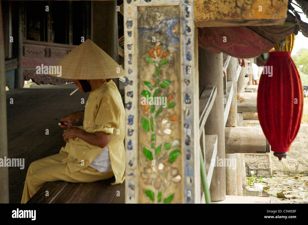 Smoking elderly asian female hi-res stock photography and images - Alamy