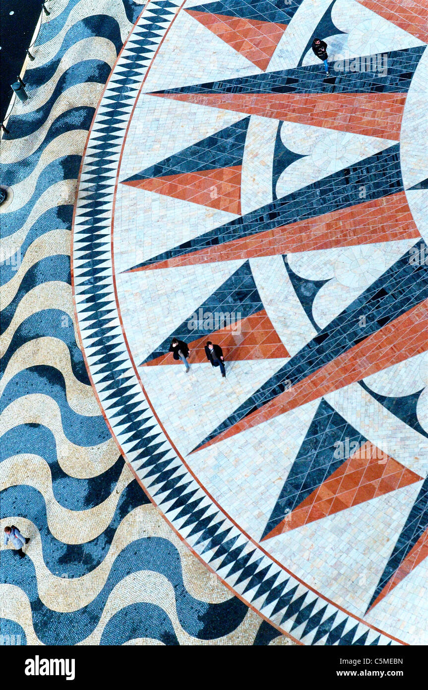 people walking over giant compass rose at Lisbon Stock Photo - Alamy