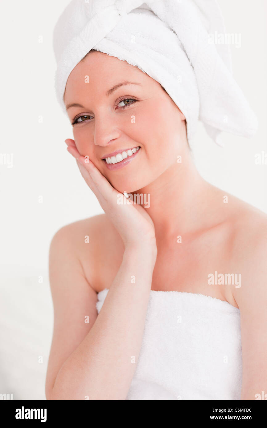 Attractive young woman wearing a towel Stock Photo - Alamy
