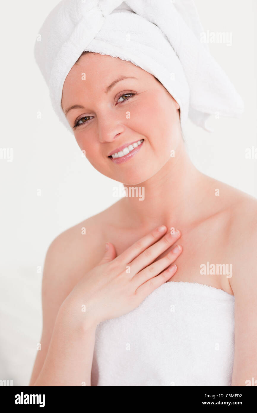 Pretty young woman wearing a towel Stock Photo - Alamy