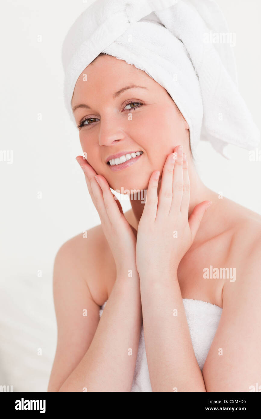 Cute young woman wearing a towel Stock Photo - Alamy