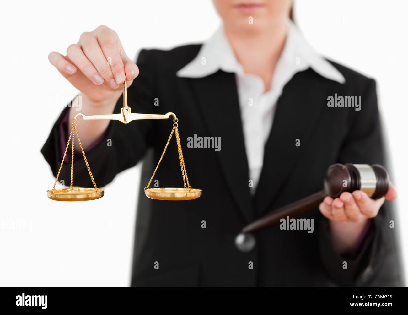 Woman holding a gavel and scales of justice Stock Photo - Alamy