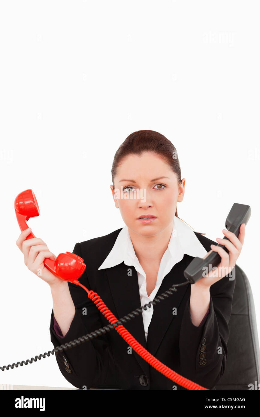 Overbooked beautiful secretary Stock Photo - Alamy