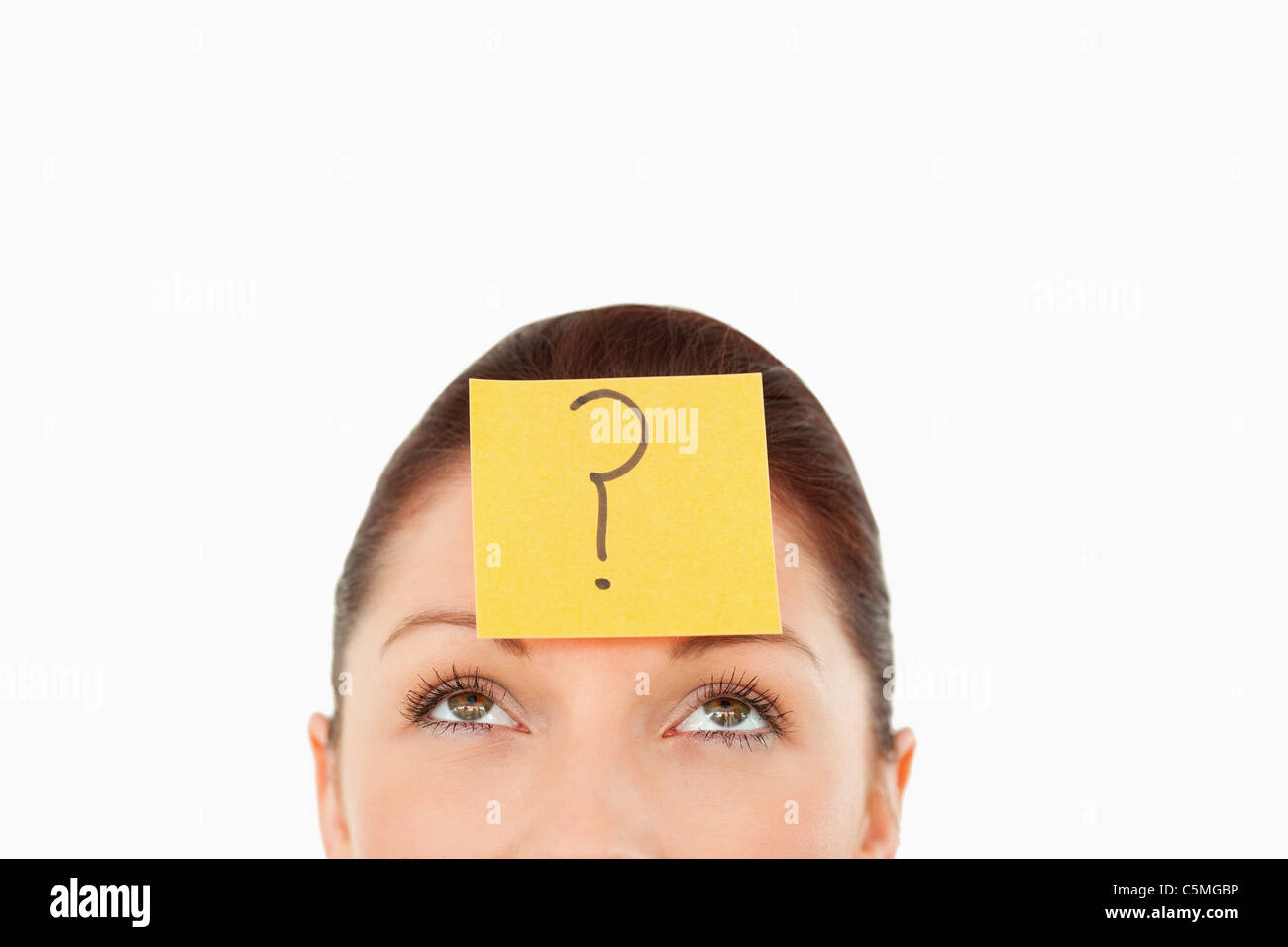 Young woman with a question tag on her forehead Stock Photo - Alamy