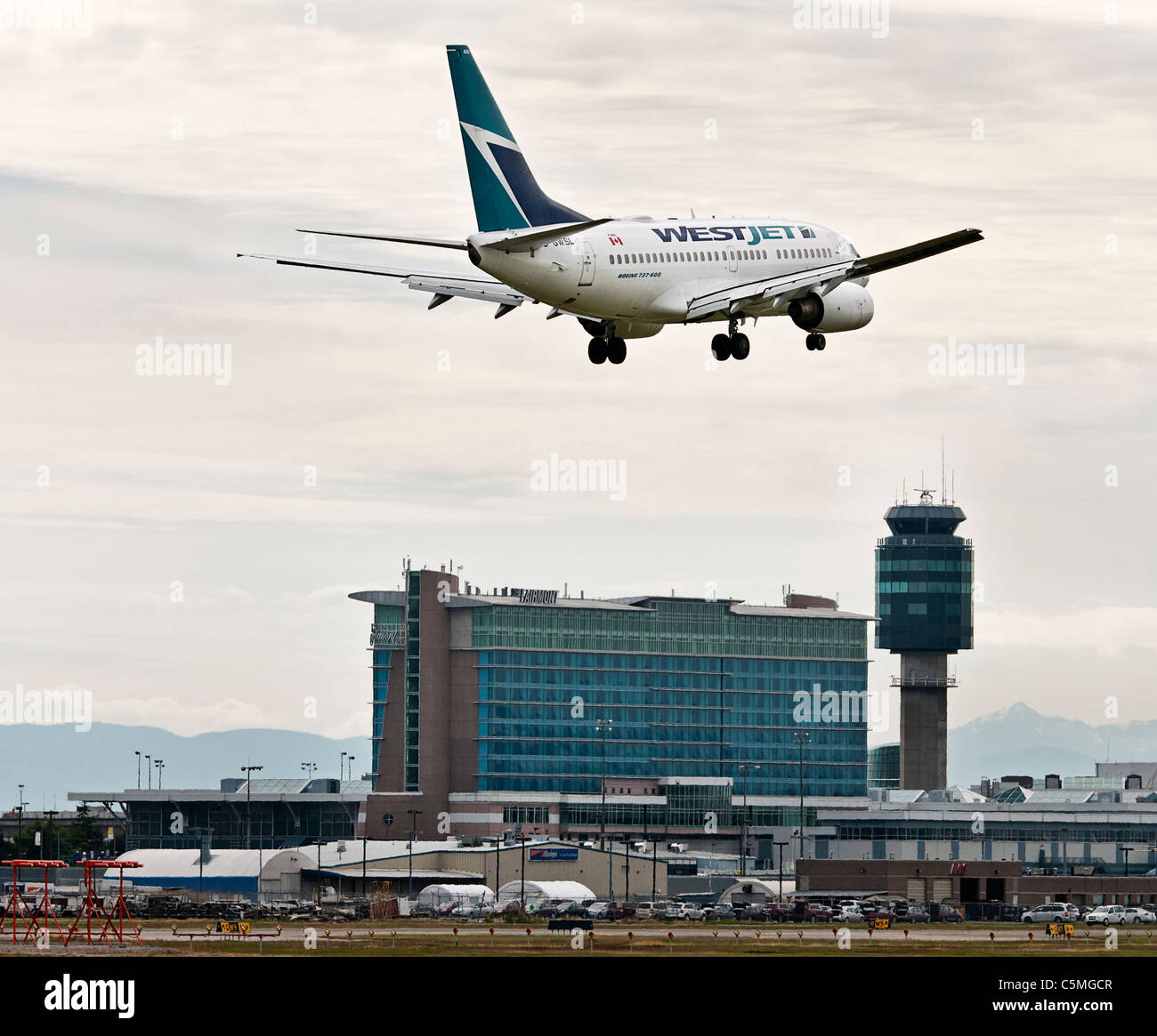 A Westjet Airlines Boeing 737-600 passenger jet is seen as it lands at ...