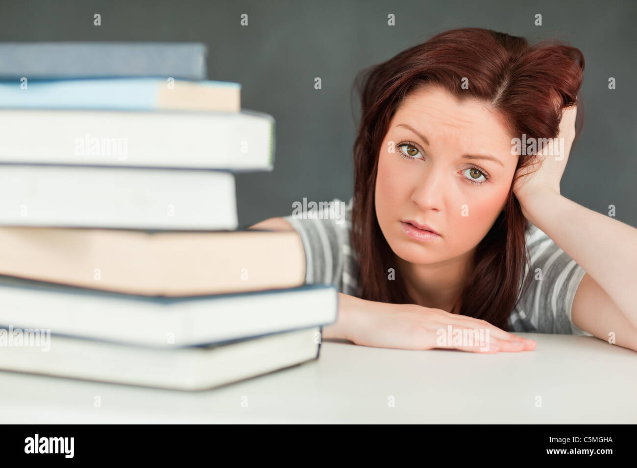 Hopeless student in a classroom Stock Photo - Alamy