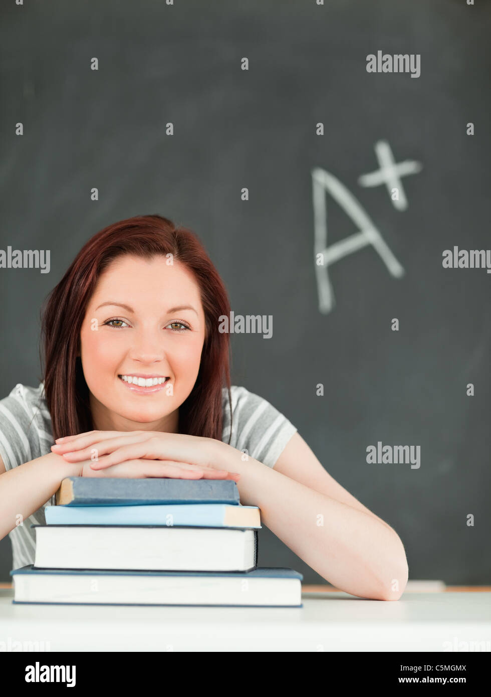 Portrait of a studious young woman Stock Photo - Alamy