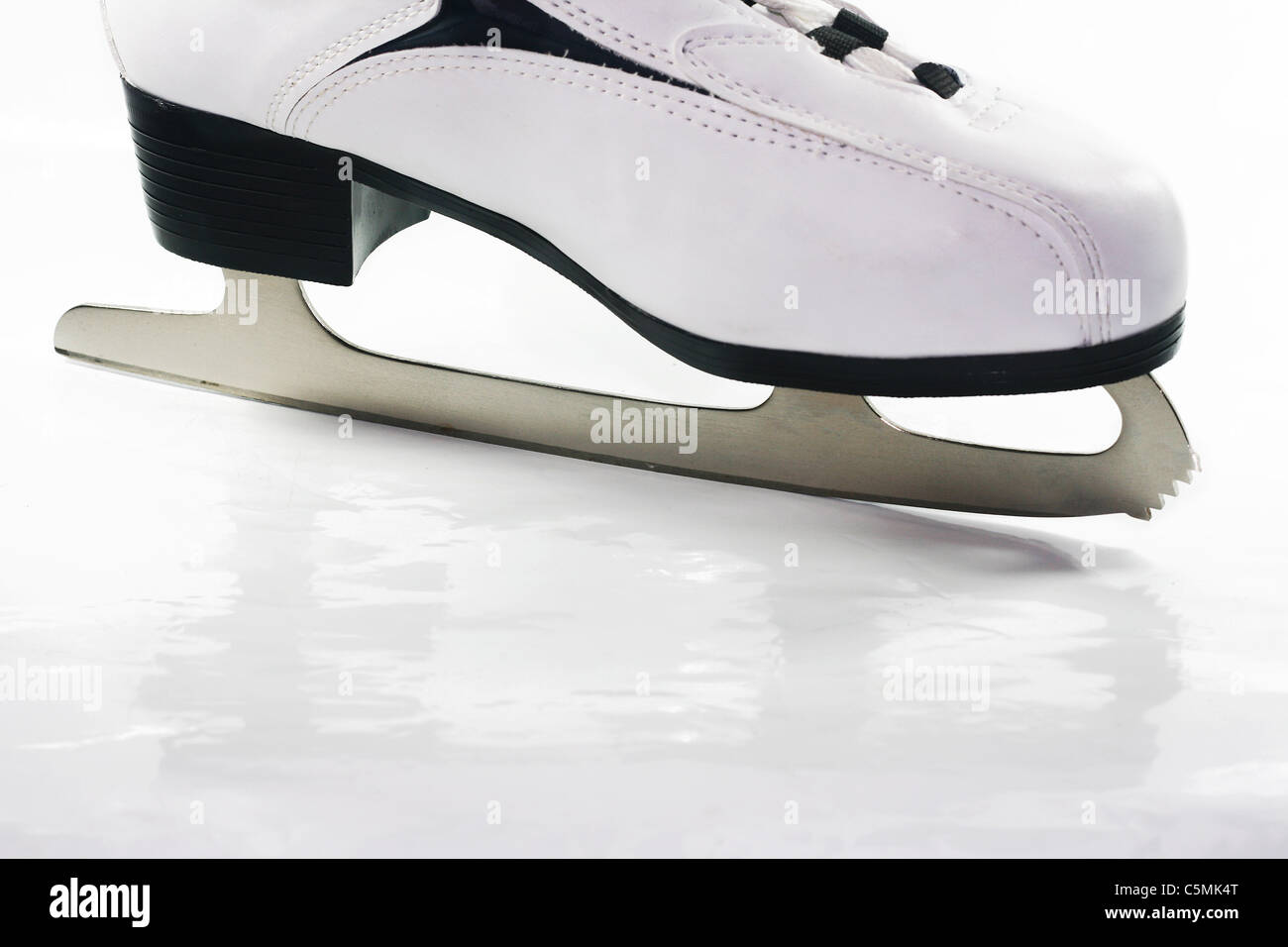 ice skates on white background Stock Photo - Alamy