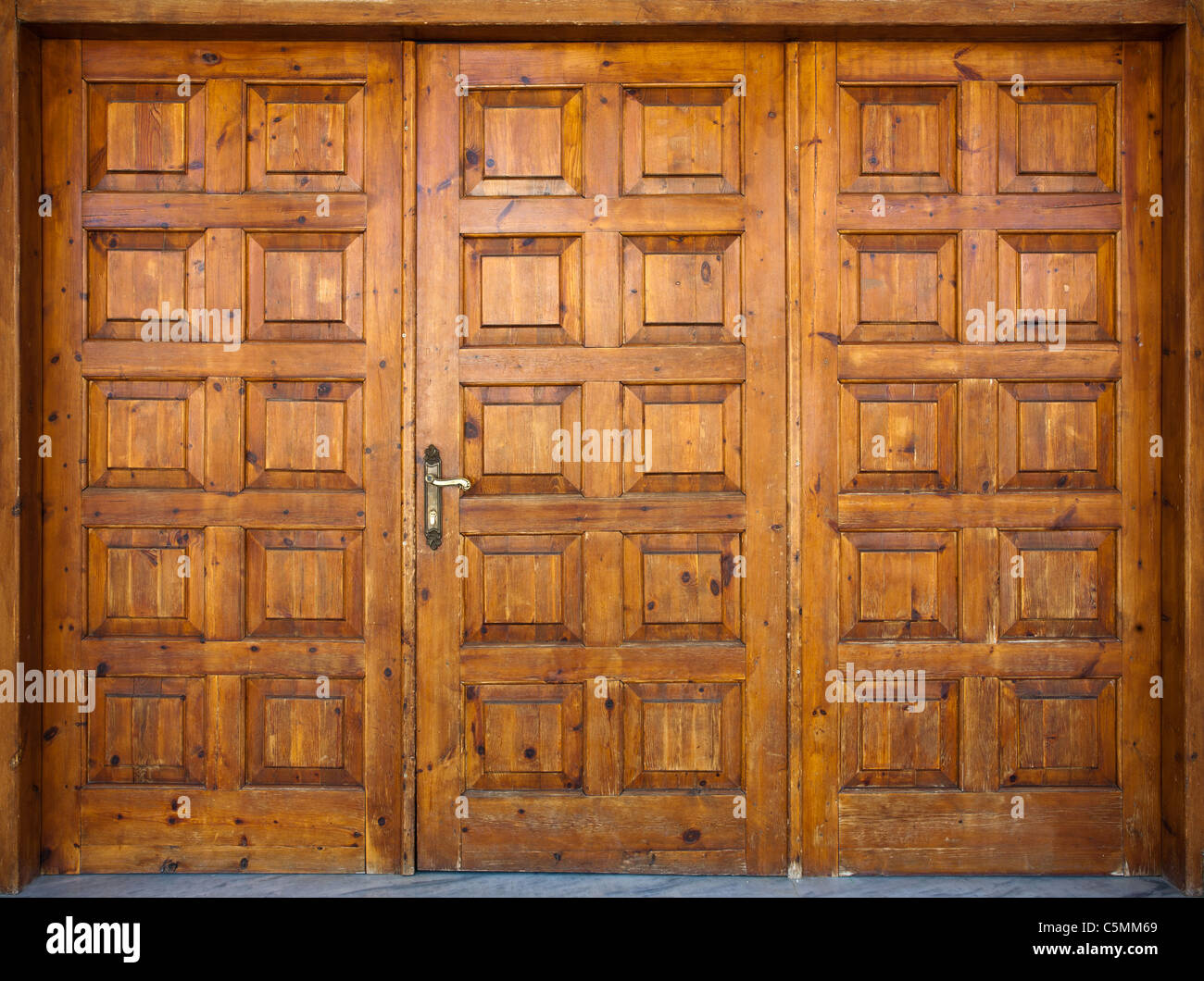 Old wide wooden doors, entrance of a church Stock Photo - Alamy