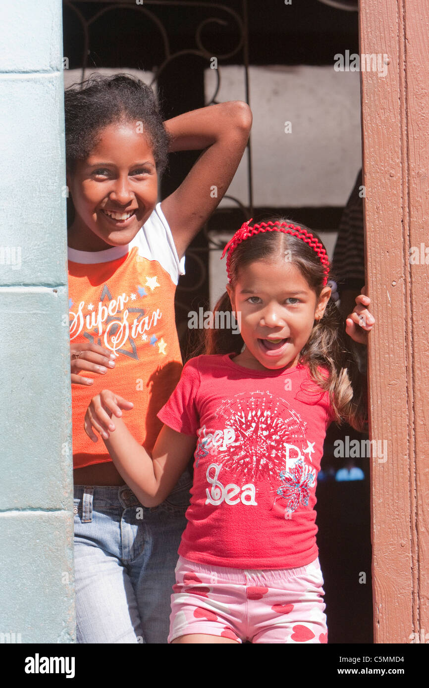 Cuba, Trinidad. Two Young Girls Stock Photo - Alamy