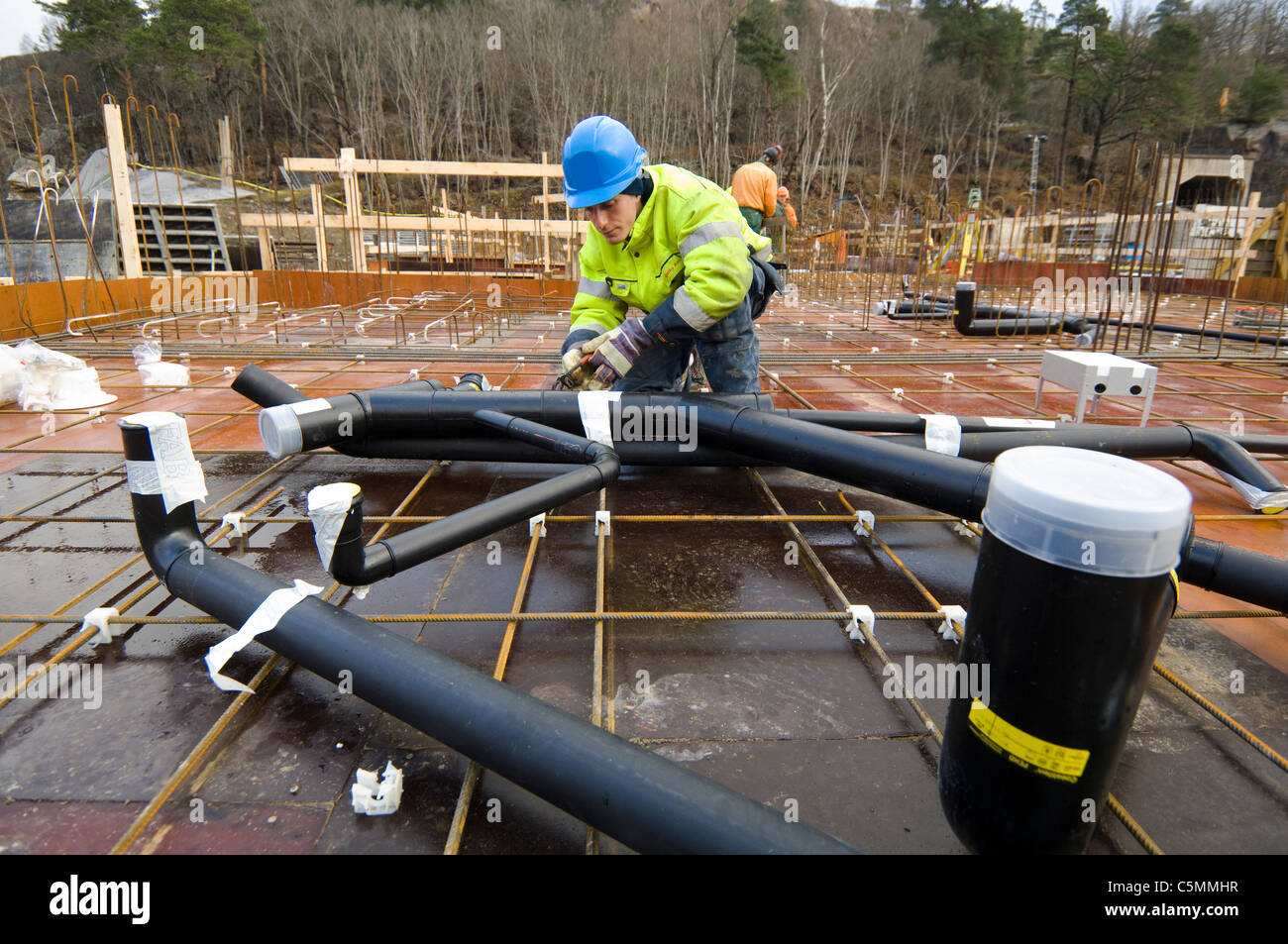 A worker at construction site Stock Photo - Alamy