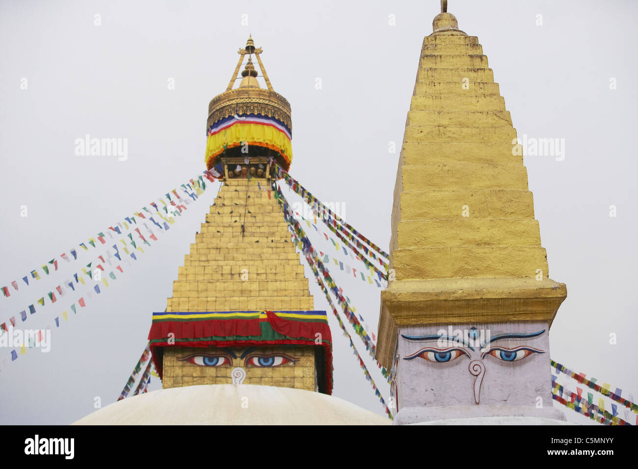 The eyes of the Buddha gaze out from the Boudhanath stupa, Bodhnath ...