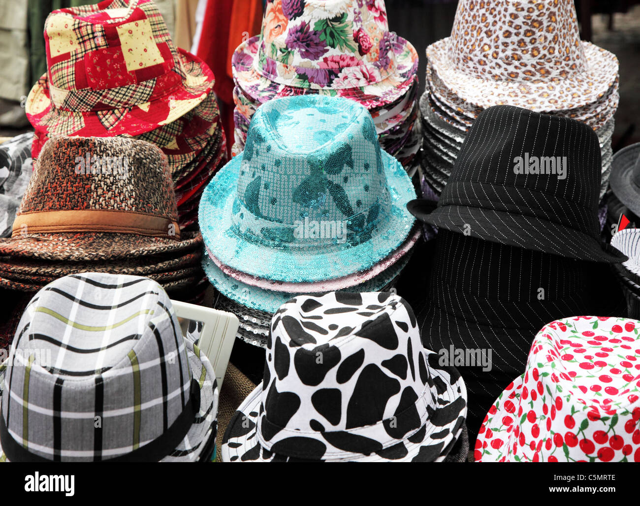 Colourful hats on market stall Stock Photo - Alamy