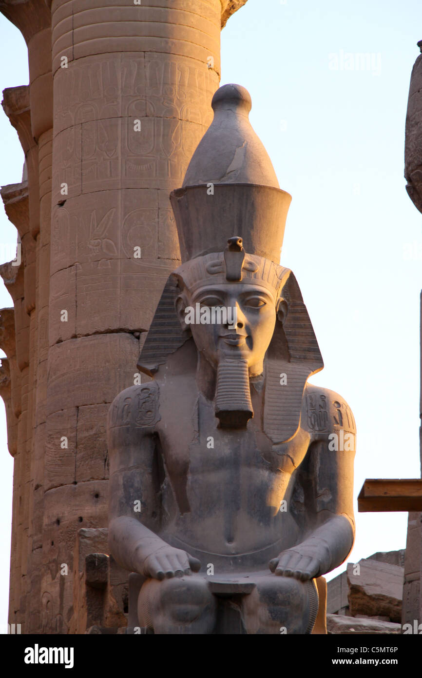 King Ramses II at luxor temple -double crowned statue Stock Photo - Alamy