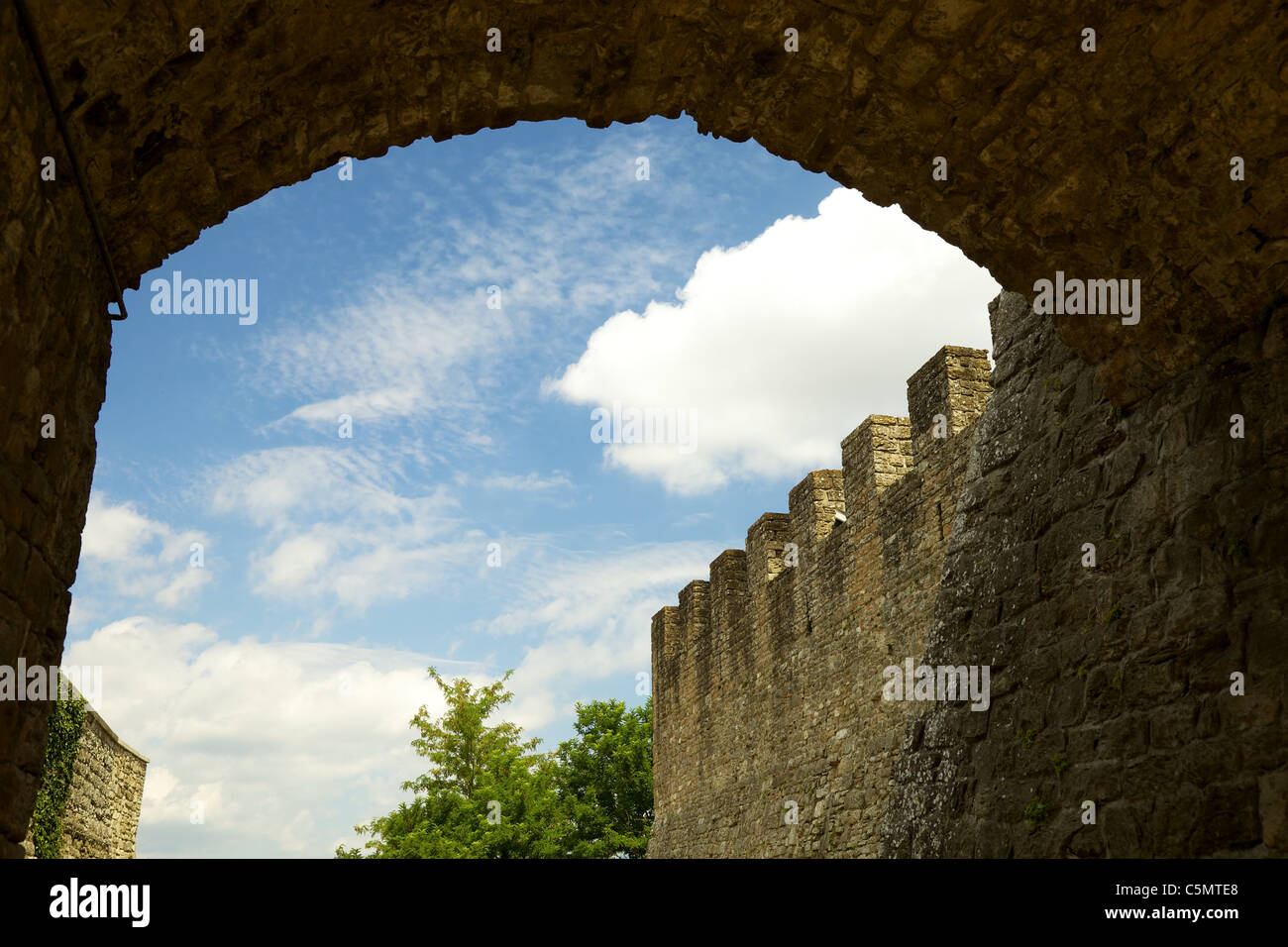 The arch and the castle Stock Photo - Alamy