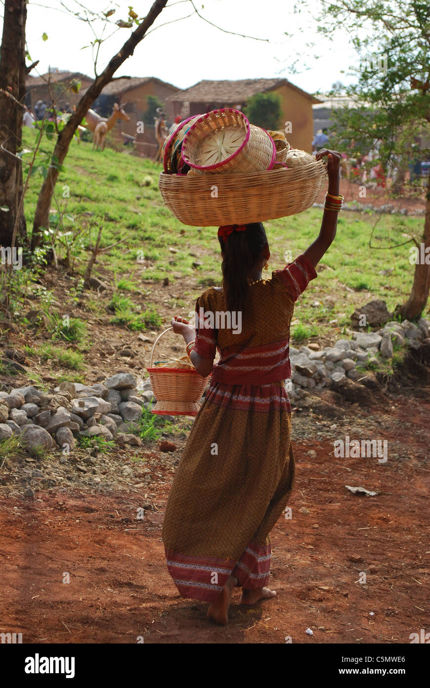 girl carrying bucket Stock Photo - Alamy