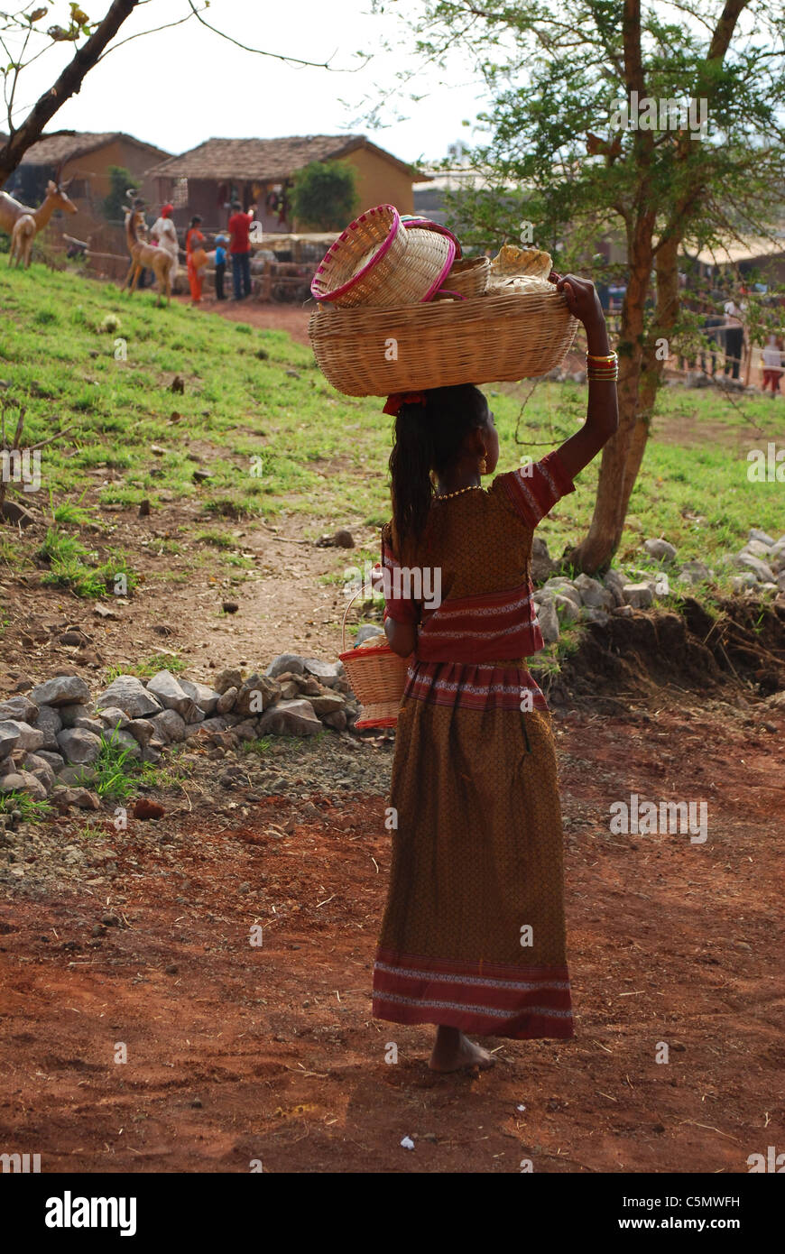 girl carrying bucket Stock Photo - Alamy