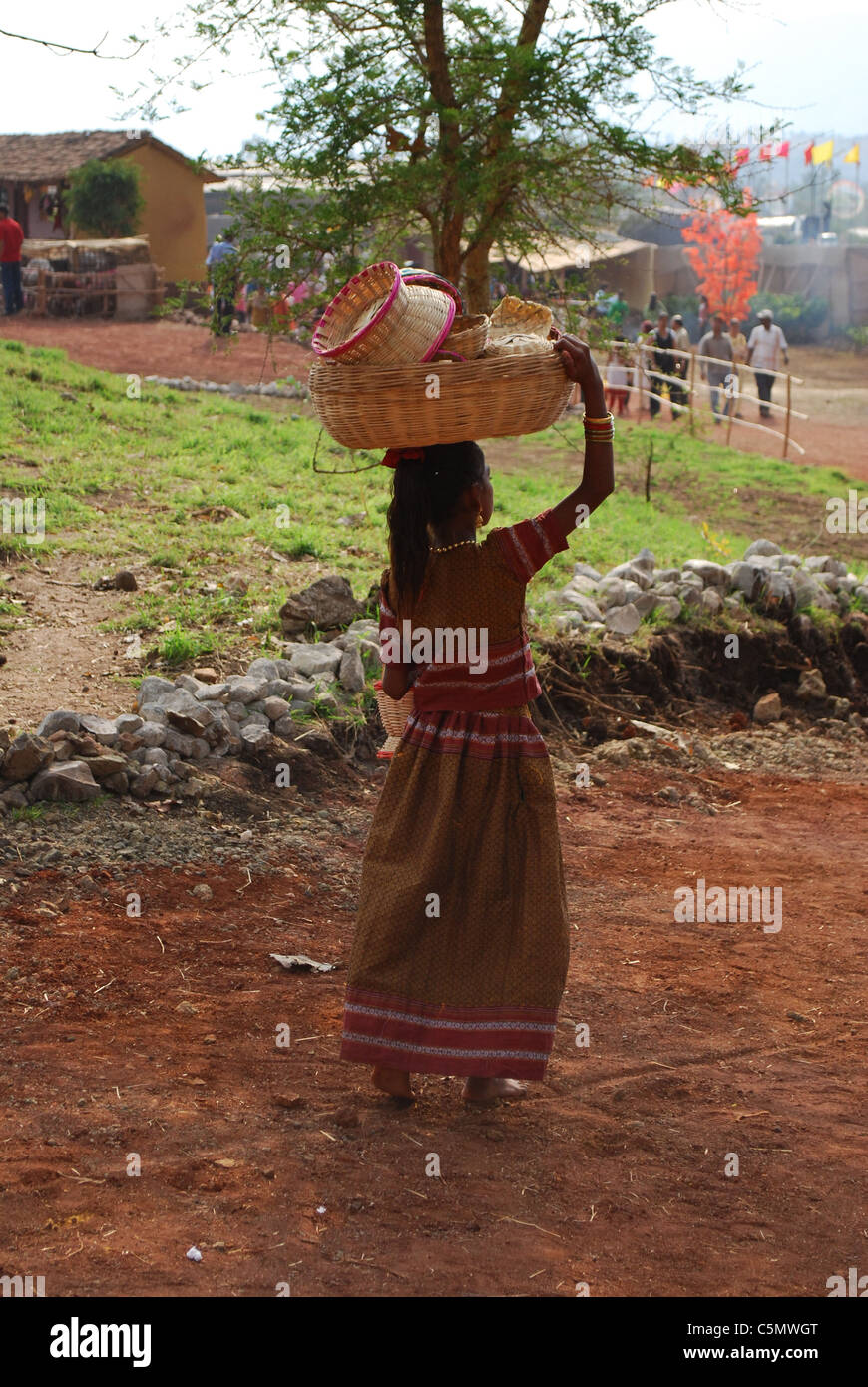 Girl carrying a bucket hi-res stock photography and images - Alamy