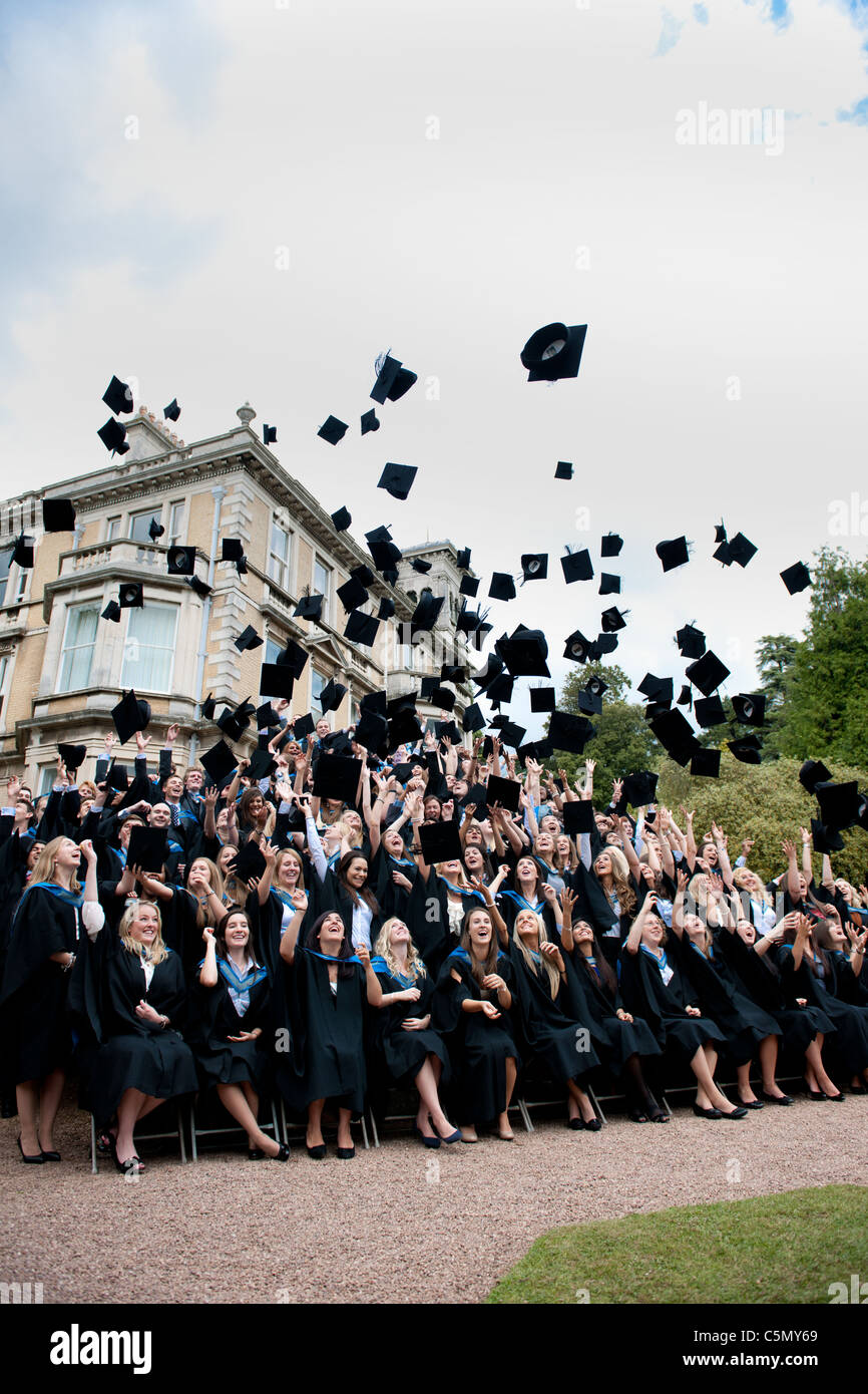Graduation students throw hats hi-res stock photography and images - Alamy