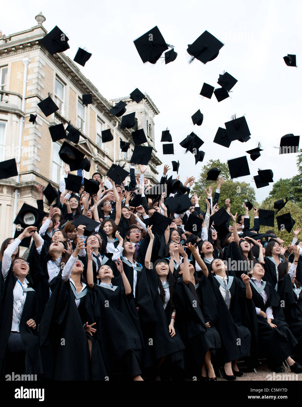 Graduation students throw hats hi-res stock photography and images - Alamy