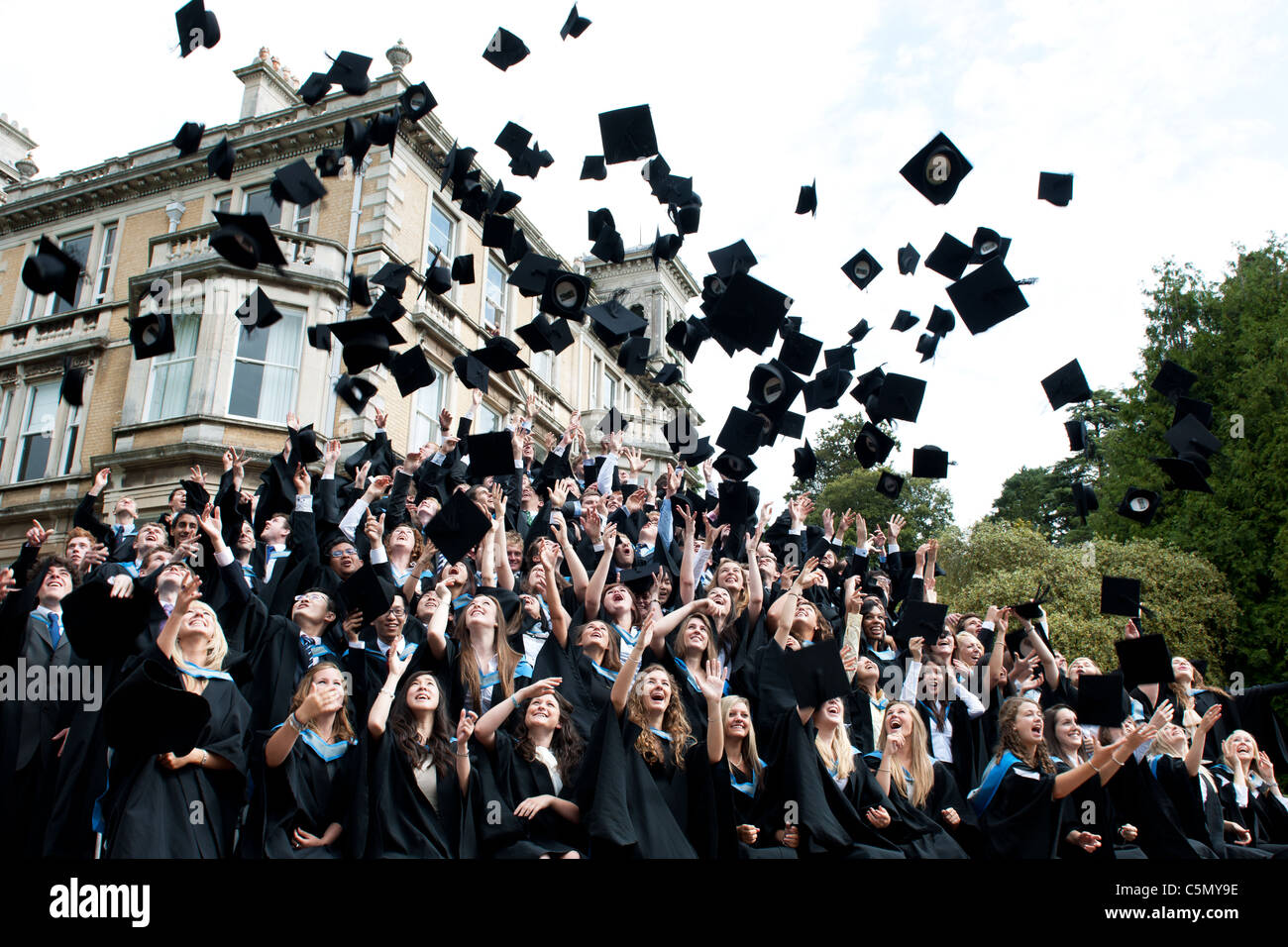 Graduation students throw hats hi-res stock photography and images - Alamy