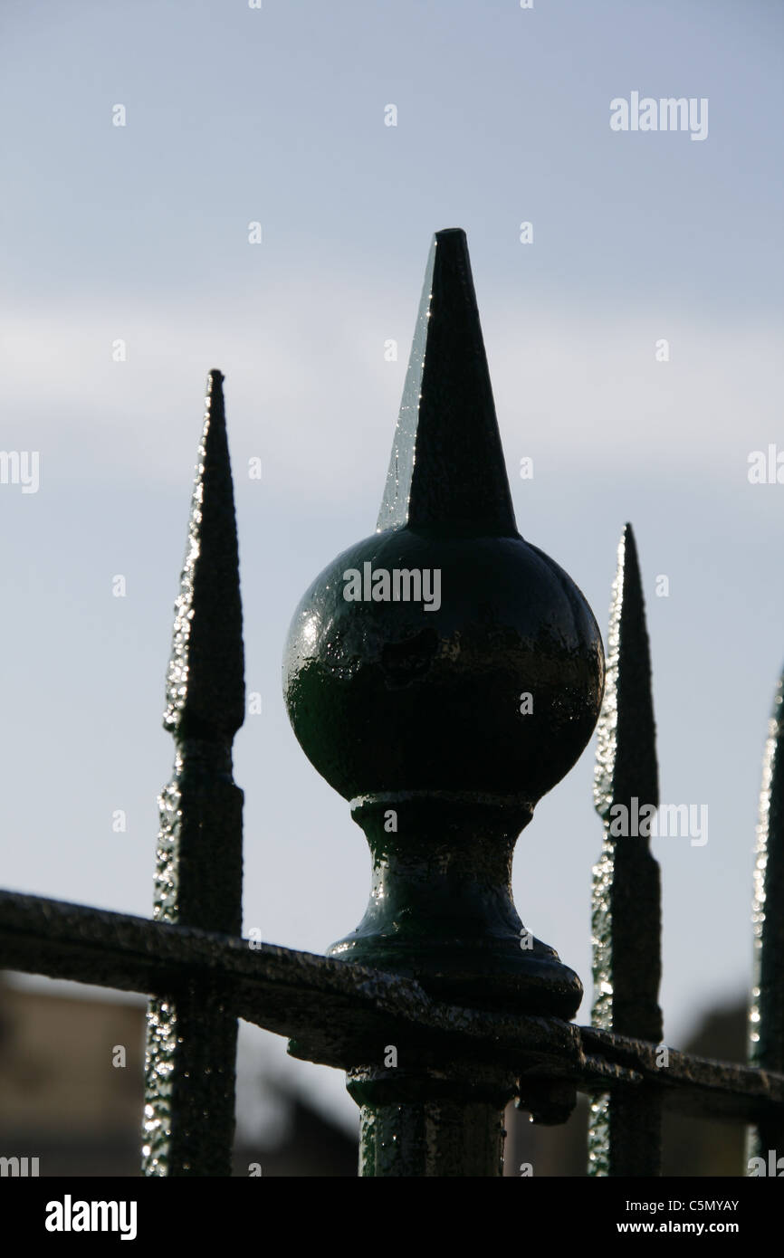 Sharp spikes on gate post Stock Photo - Alamy