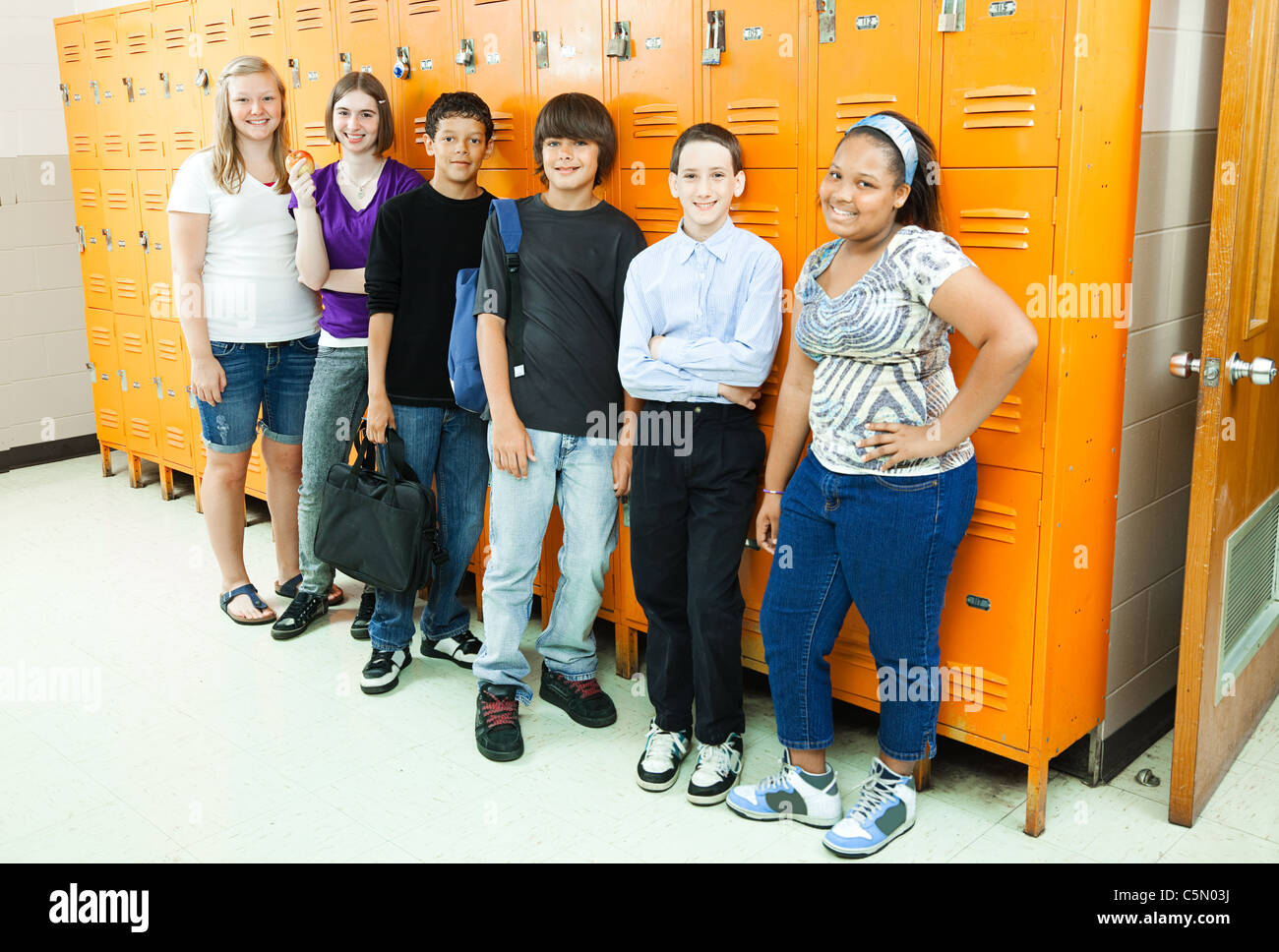 Group of diverse high school students by the school lockers Stock Photo ...