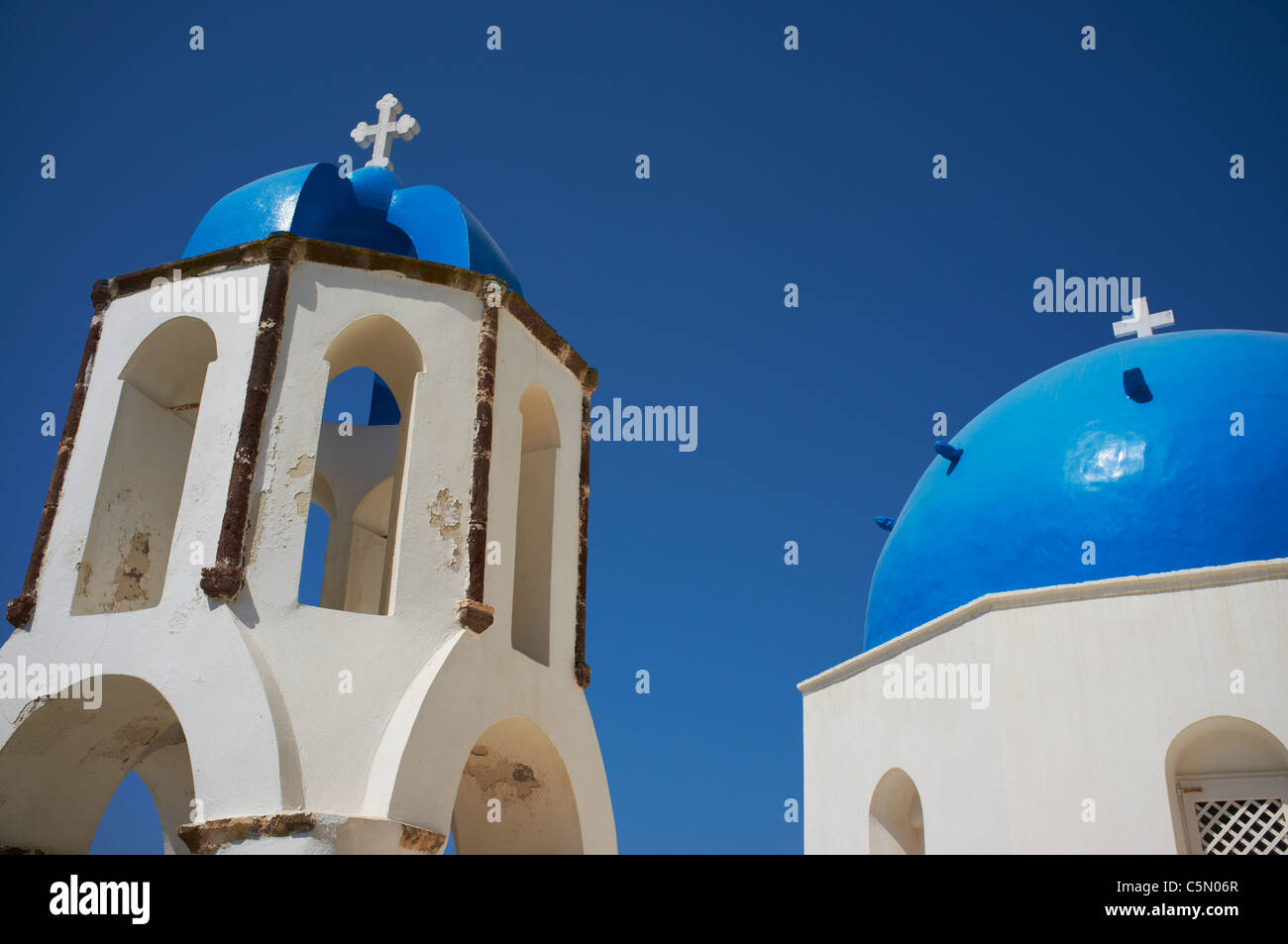 The famous blue domes of Anastasi Church in the Village of Oia ...