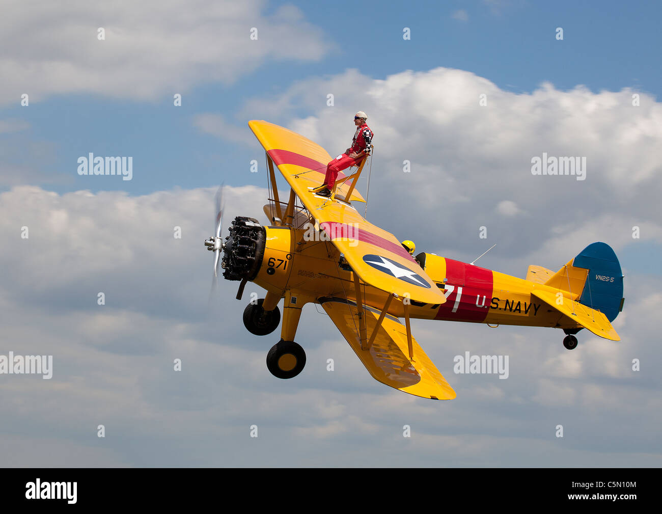 Boeing Stearman A75L300 Kaydet G-CGPY in flight with wing-walker on ...