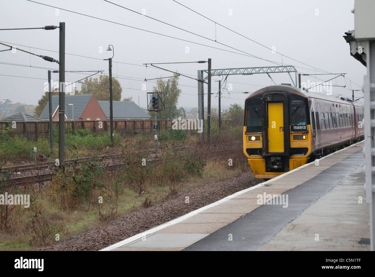 EMT East Midlands train British Rail Class 158 158813 stops at Grantham ...
