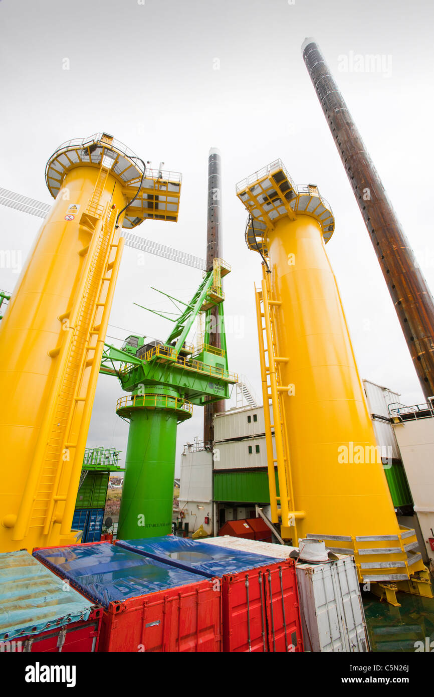 The jack up barge, Goliath being towed out by tug to the Walney ...