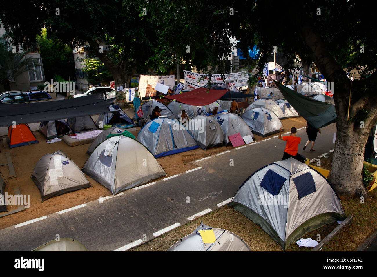 Israelis camping in the Tent City compound in Rothschild avenue in Tel ...