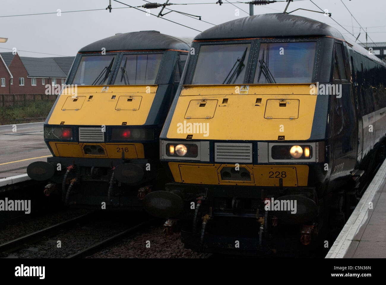 Two National Express trains at Grantham station on overcast day. East ...
