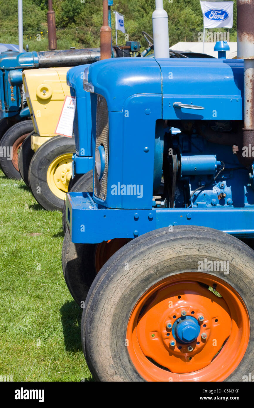 Row Of Yellow Tractors High Resolution Stock Photography and Images - Alamy