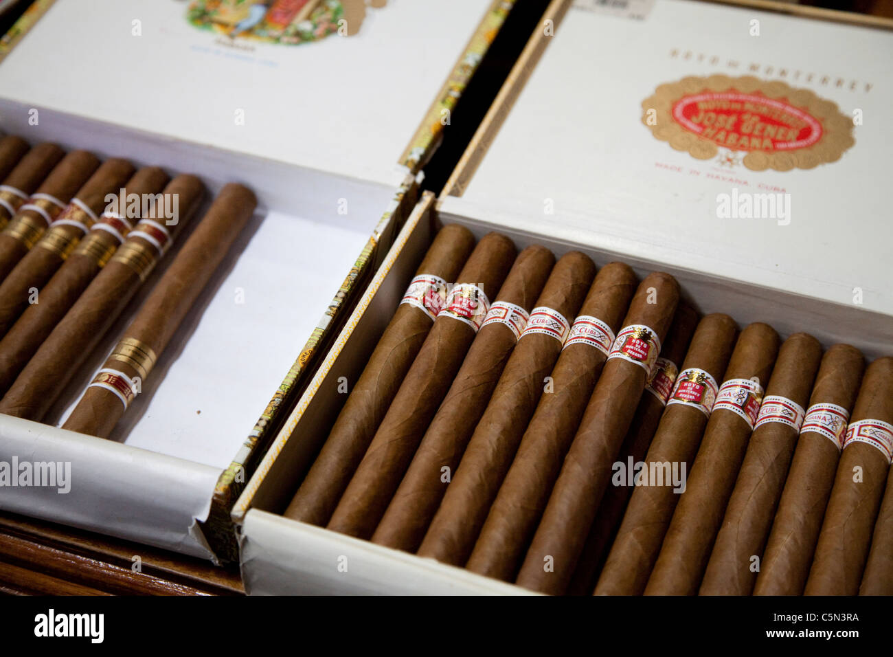 A selection of boxed Cuban cigars for sale in a cigar factory souvenir ...