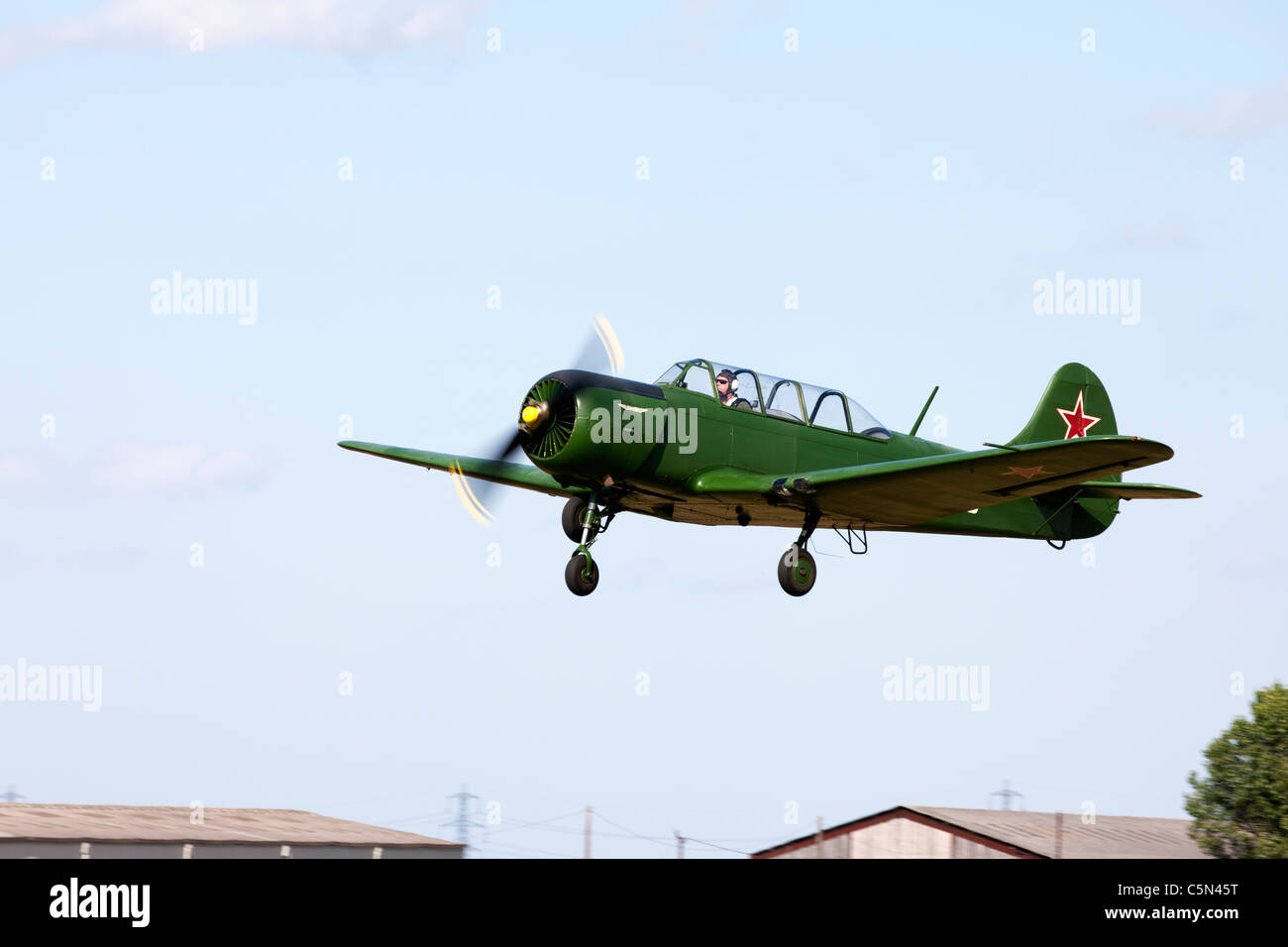 Yakolev Yak-18A 03 G-CEIB in flight taking-off Stock Photo - Alamy