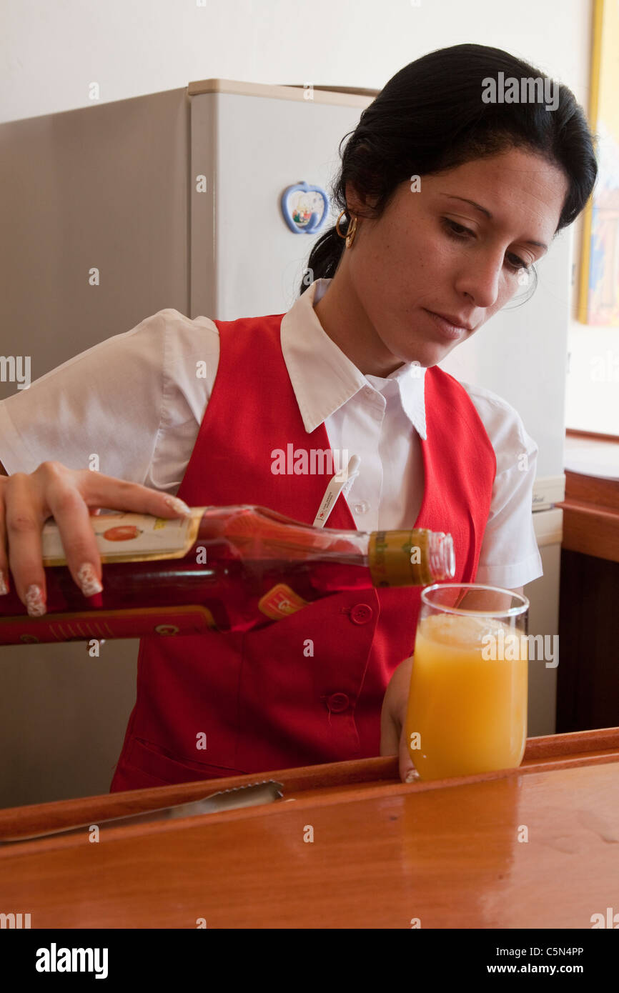 Cuba, Trinidad. Woman Bartender Making a Trinidad Colonial Drink Stock ...